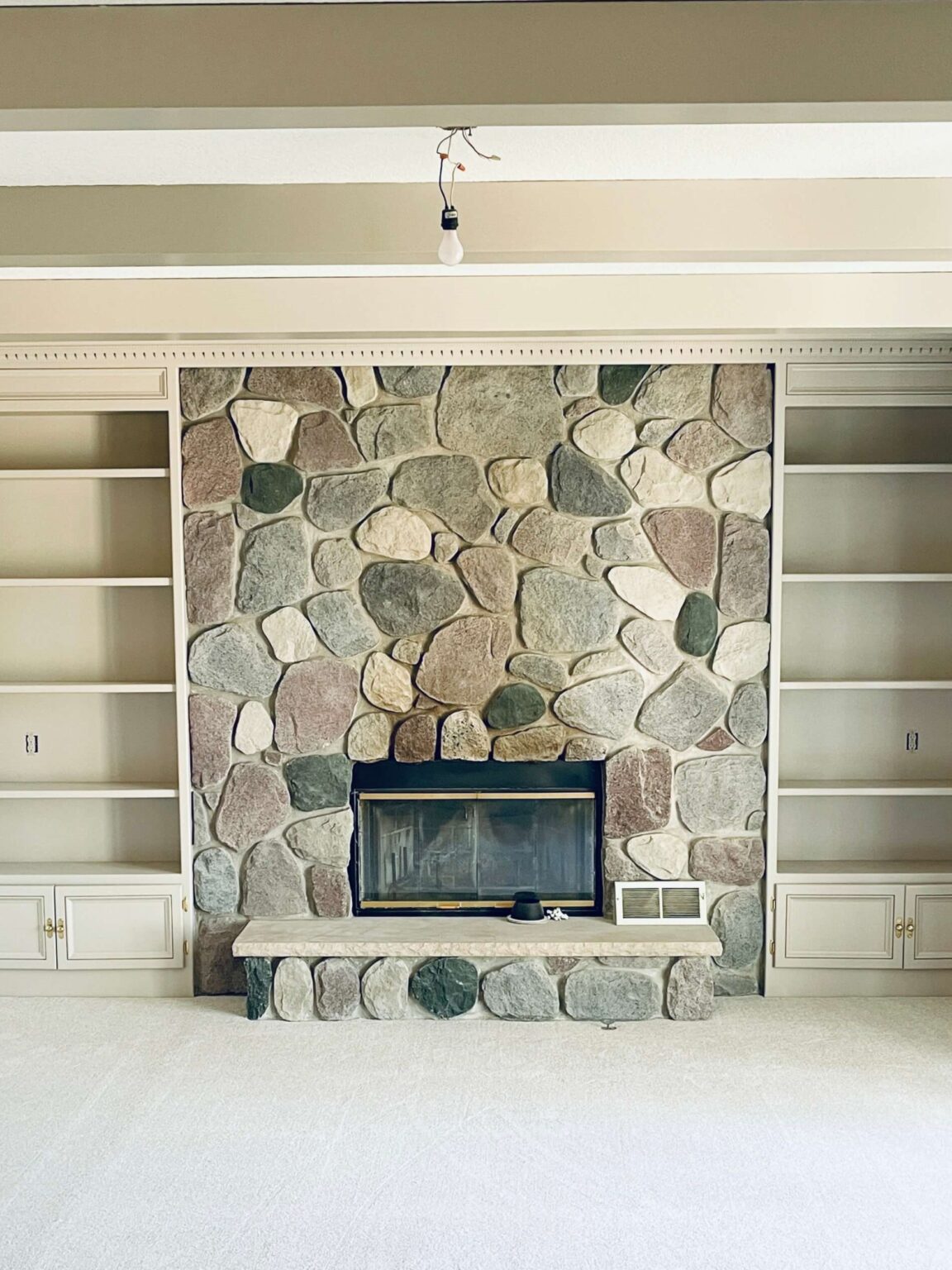Over Grouted Stone Fireplace Makeover - Lake and Lumber